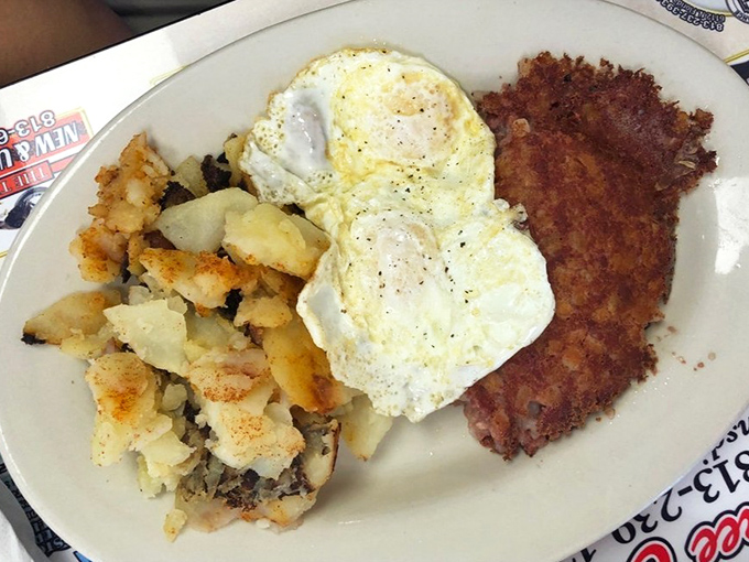 Corned beef hash with sunny-side-up eggs—the breakfast equivalent of finding a vintage Cadillac in perfect condition at a garage sale.