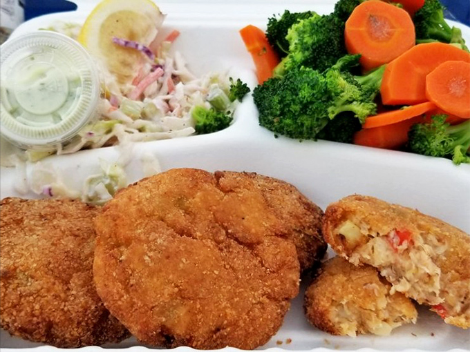 Golden-crusted crab cakes with a side of fresh veggies. Crispy exterior giving way to sweet, delicate crab—the textural tango we all crave.