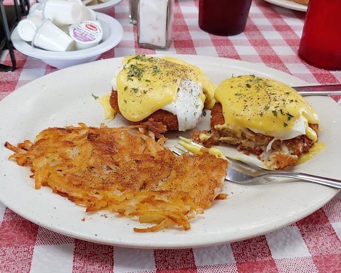 Eggs Benedict gets the coastal Florida treatment with crab cakes. Hollandaise sauce should always cascade like this – confident and unapologetic.
