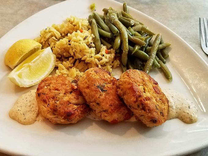 These crab cakes aren't just golden brown—they're Florida sunshine on a plate, with minimal filler and maximum flavor.