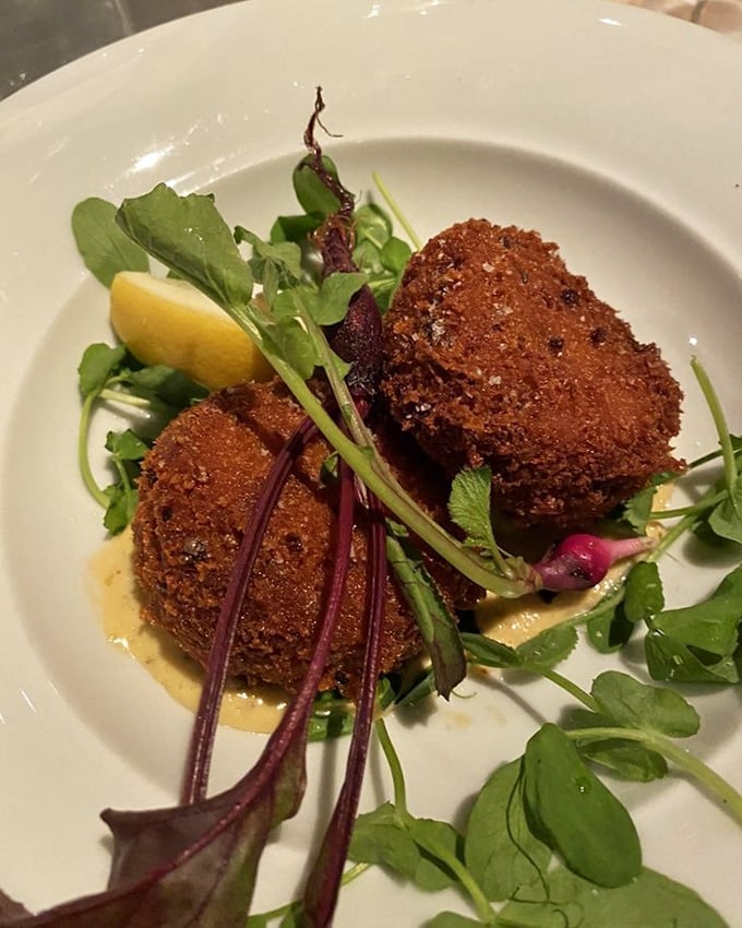 These crab cakes don't hide behind unnecessary fillers—just pure, sweet crabmeat with a golden crust that shatters with each bite.