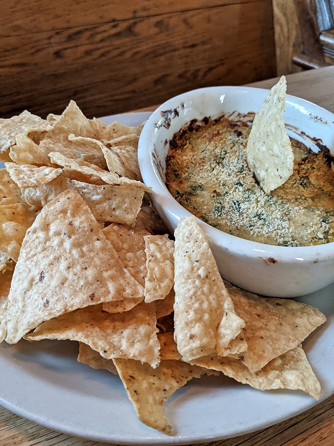 Chips and dip playing at varsity level. This bubbling, cheesy concoction demands to be scooped up and savored without shame or restraint.