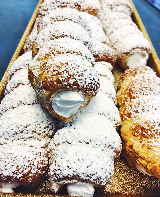 Cream horns that would make any Italian grandmother nod in approval. Layers of delicate pastry cradle clouds of sweet filling—resistance is futile.