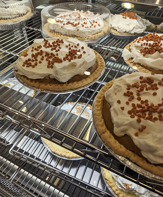 Cream pies with meringue so high they need their own zip code. These aren't desserts—they're architectural achievements with a sweet disposition.