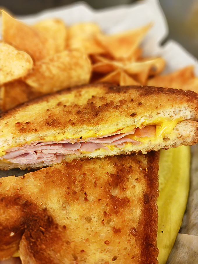This Cuban sandwich has achieved the perfect golden ratio of crisp exterior to melty interior—architectural perfection between bread.