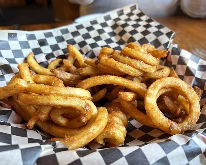 Curly fries: the rebellious teenagers of the potato world, refusing to conform to straight-line society. And thank goodness for that.