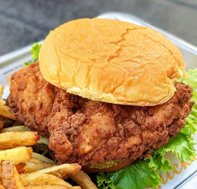 Behold the Deluxe Chicken Sandwich in all its glory—where crispy meets fresh in a bun-hugged romance that puts fast food chains to shame.