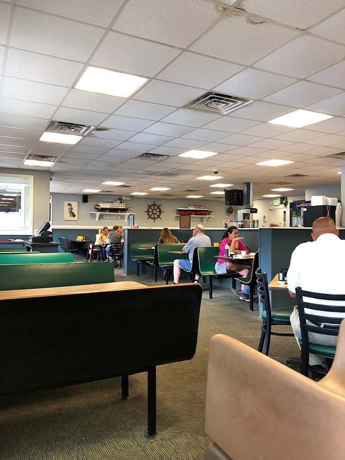 The dining room hums with the satisfied murmurs of locals who've discovered what tourists are still searching for – authentic Virginia Beach flavor.