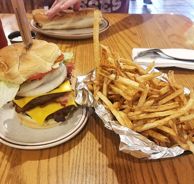 A double cheeseburger that demands both hands and possibly a nap afterward. Those hand-cut fries aren't just a side—they're the supporting actor who steals the scene.