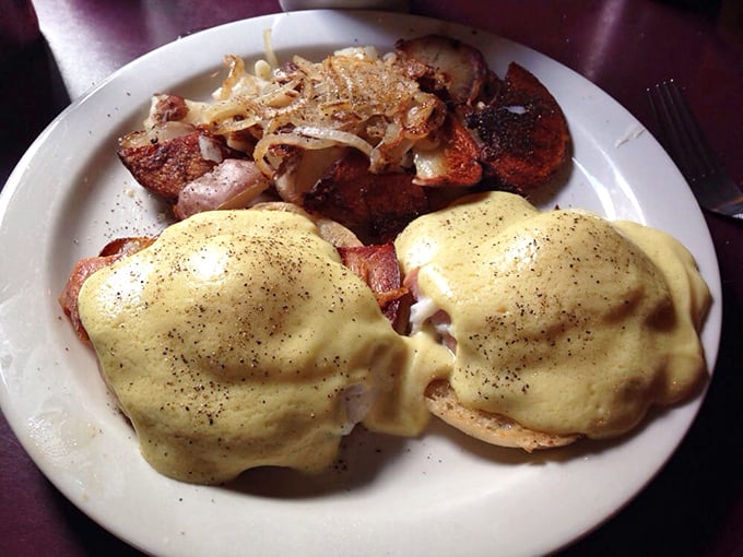 Another Benedict masterpiece with perfectly poached eggs and hollandaise that cascades like a buttery waterfall. Breakfast architecture at its finest.
