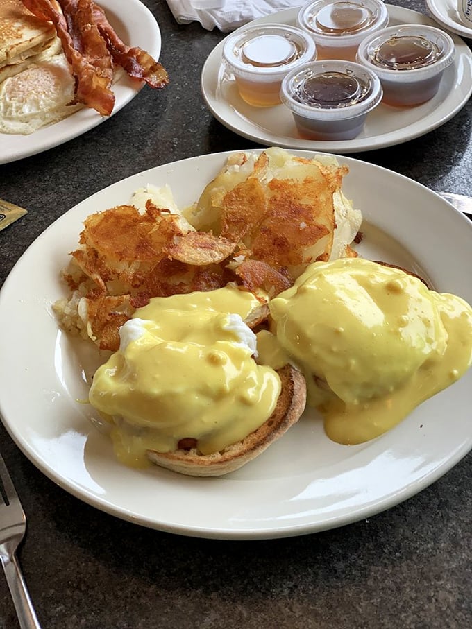Hollandaise cascades like liquid gold over this masterpiece of breakfast engineering and artistry.