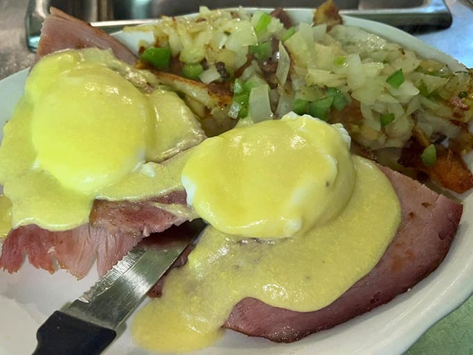 Eggs Benedict that would make a brunch snob weep with joy – that hollandaise sauce practically glows with buttery promise.