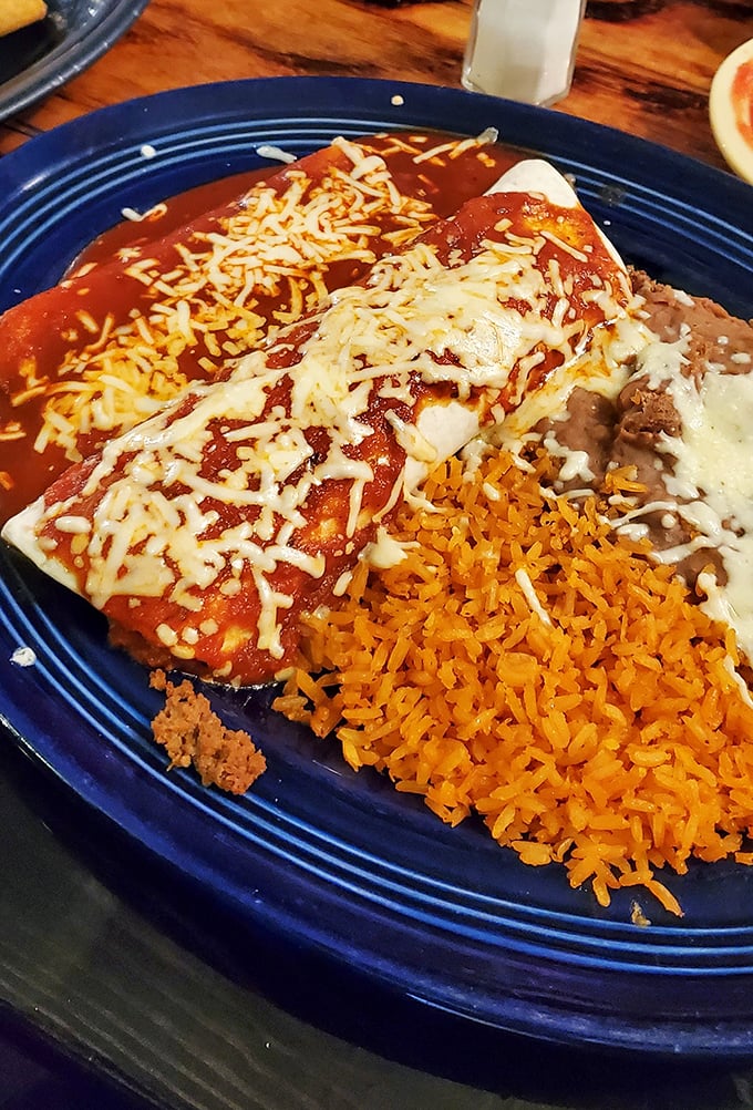 These enchiladas aren't just covered in sauce and cheese—they're tucked in with the care of a grandmother saying "Eat, eat!"
