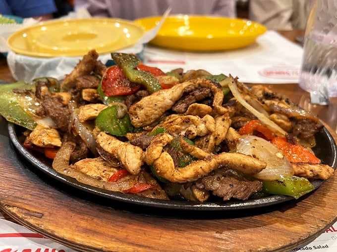 Sizzling fajitas that announce their arrival before you see them. The colorful pepper and onion confetti is nature's perfect garnish.