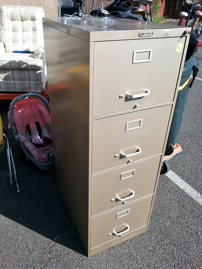 This filing cabinet has seen some things. Now declassified from office duty, it's ready to organize your home office or craft supplies with military precision. 