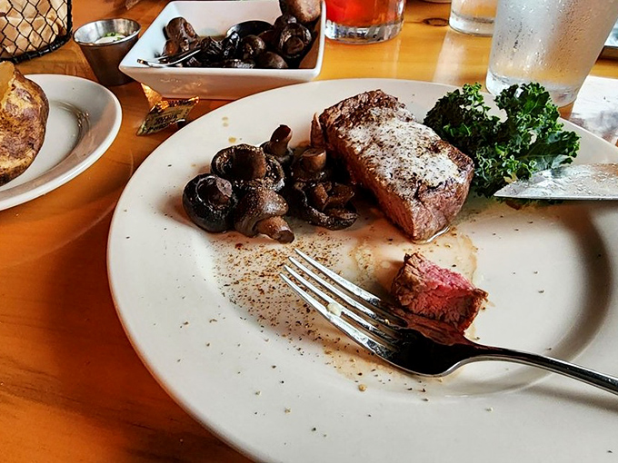 This filet mignon with sautéed mushrooms isn't just dinner—it's the reason people drive for hours through Wisconsin's countryside.