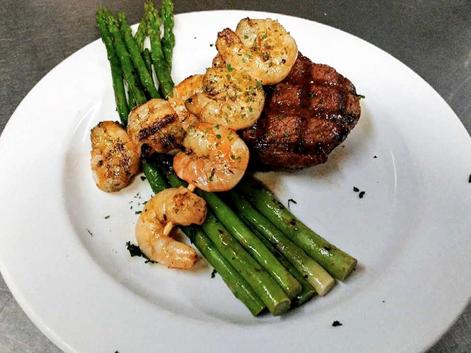 The surf and turf that launched a thousand food dreams. Perfectly grilled shrimp nestled against a steak that needed no sauce—just respect and proper cooking.