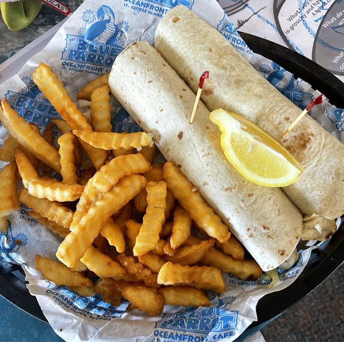The wrap that launched a thousand return trips—simple fish tacos elevated by the knowledge they were swimming nearby just hours ago.