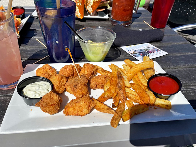 The fish and chips that launched a thousand debates about "Florida's best"—golden chunks of grouper with hand-cut fries and house-made sauces.