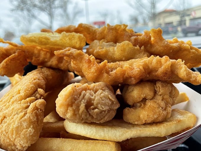 The ultimate surf and turf for the indecisive seafood lover. That golden batter is the great equalizer—making everything it touches absolutely irresistible.