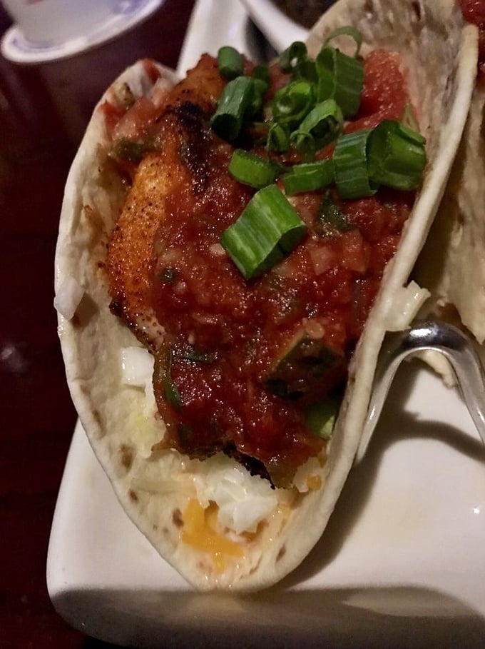 Fish tacos that make you question why you'd ever eat anything else – perfectly seasoned fish nestled in a tortilla like it was meant to be there.