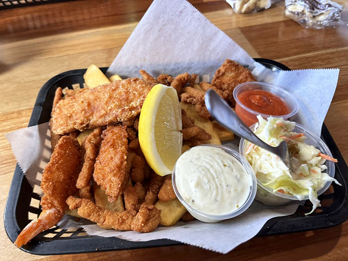 The fisherman's platter doesn't just feed you—it tells stories of the sea with each crispy, golden morsel of perfectly fried seafood.