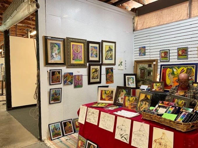 An artist's corner bursting with vibrant colors and creativity. Each frame holds a piece of someone's imagination—and possibly the perfect accent for your living room wall.