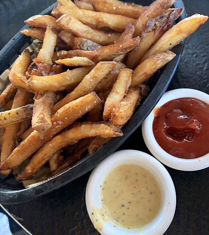 Hand-cut fries with dipping sauces that demand to be explored. The perfect vehicle for flavor experimentation when you're not in a hot dog mood.