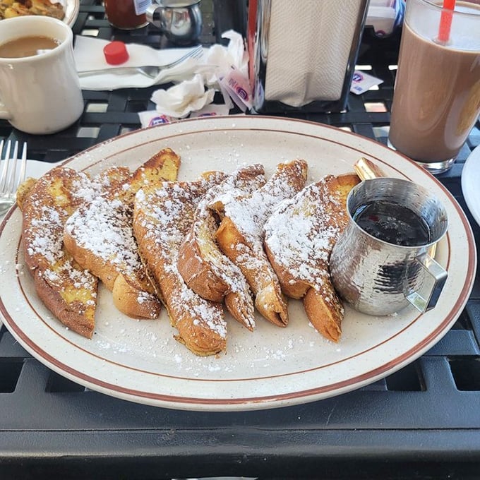 French toast that would make Elvis say "Thank you, thank you very much" – dusted with powdered sugar like fresh snow on Christmas morning.