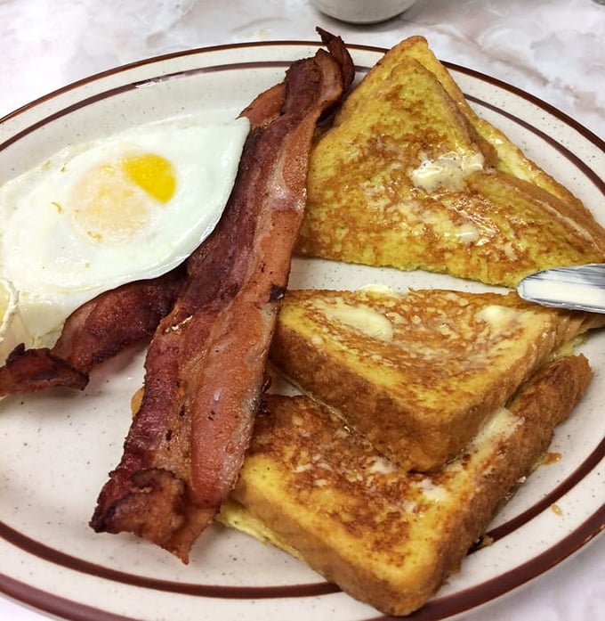 French toast that's achieved that perfect golden-brown exterior while maintaining a custardy center—the breakfast equivalent of winning the lottery.