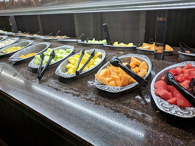 A rainbow of fresh fruit options provides the perfect alibi: "But honey, I had three plates of healthy stuff!"