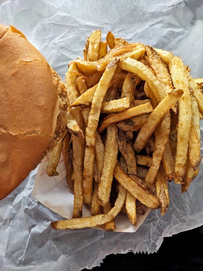 These fresh-cut fries aren't just side dishes—they're the main event. Golden, crispy exteriors giving way to fluffy potato perfection that no frozen fry could match.