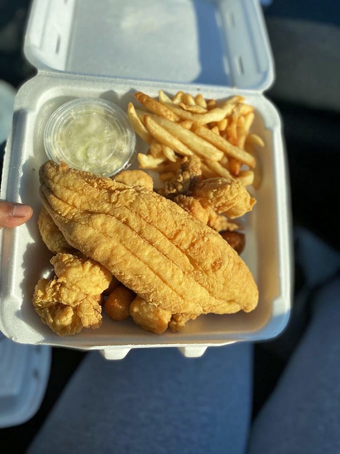 This to-go container holds the holy grail of fried flounder—crispy exterior giving way to flaky white fish that tastes like vacation.
