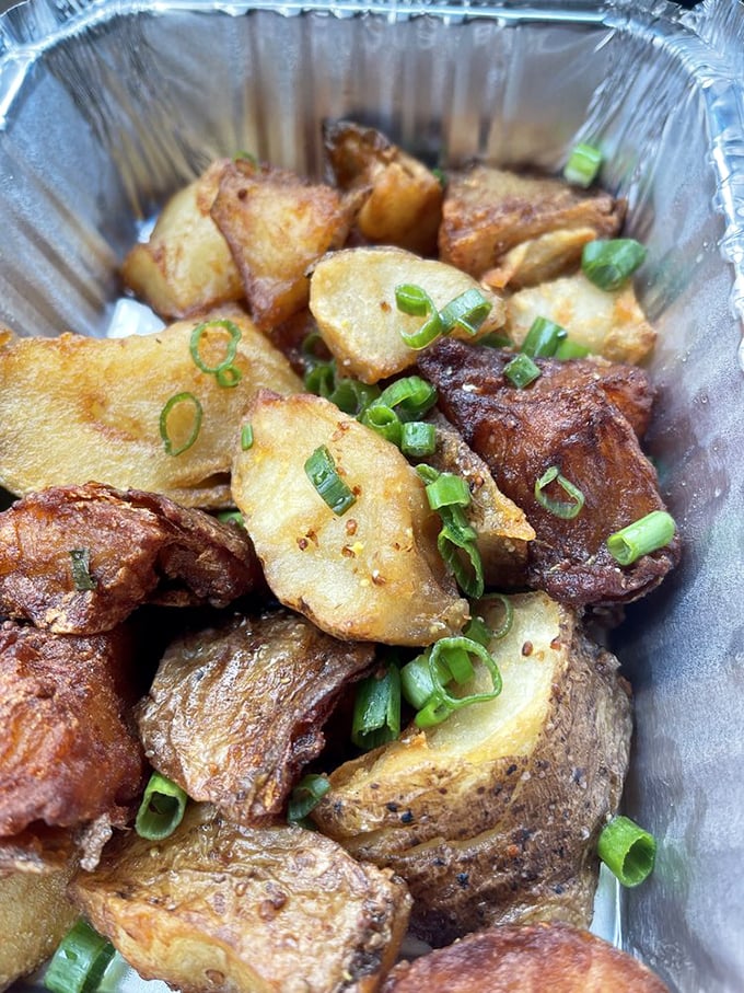 Fried potatoes that have achieved the impossible trifecta: crispy exterior, fluffy interior, and absolutely zero regrets.