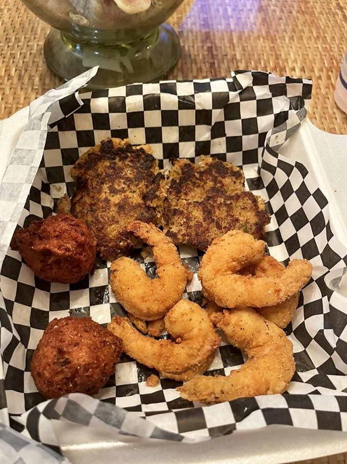 This isn't just a fried seafood basket—it's a treasure chest of Gulf goodness where each golden morsel competes for the title of "best bite."