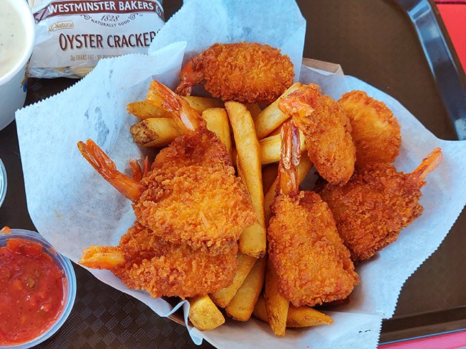 Fried shrimp and fries—the beach vacation your taste buds have been dreaming about. No sunscreen required for this golden perfection.