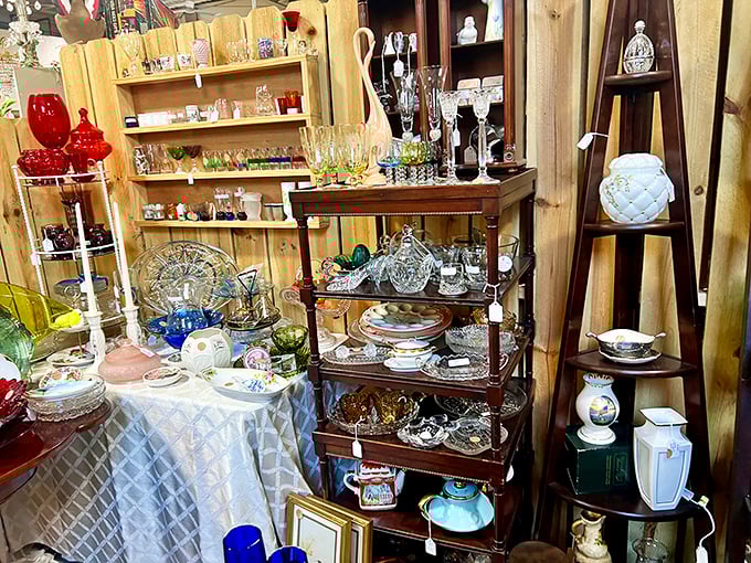 Crystal, china, and carefully arranged treasures—this booth looks like your fancy aunt's dining room, if she collected everything that sparkled since 1950.