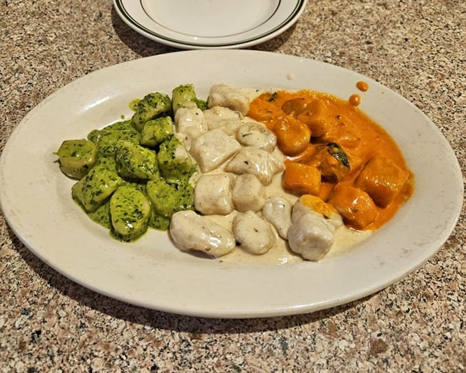Three-color gnocchi trio that looks like Italy's flag and tastes like its soul. Pasta pillows that practically float above the plate.