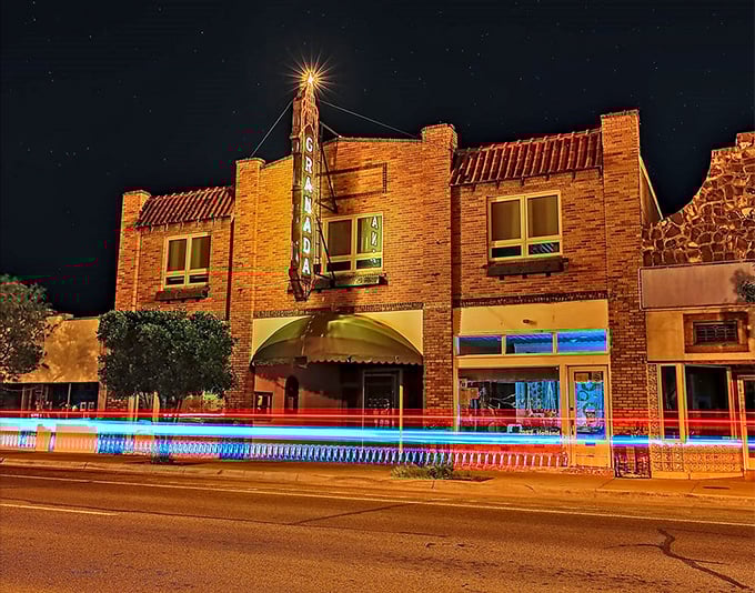 The Granada Theatre's neon glow transforms ordinary evenings into main events, proving small towns know how to light up the night. 