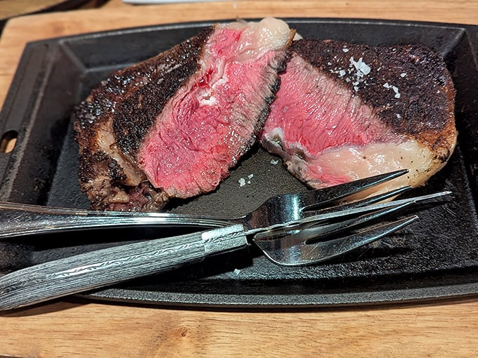 The money shot: a grass-fed ribeye with a crust that could make a baker jealous. This is what beef dreams are made of.