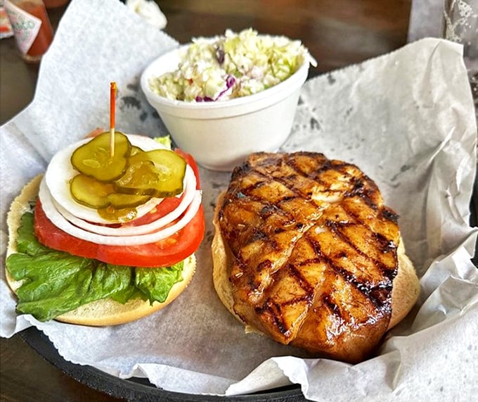 This grilled grouper sandwich looks like it's auditioning for a seafood calendar—perfectly marked, perfectly dressed, perfectly Florida.