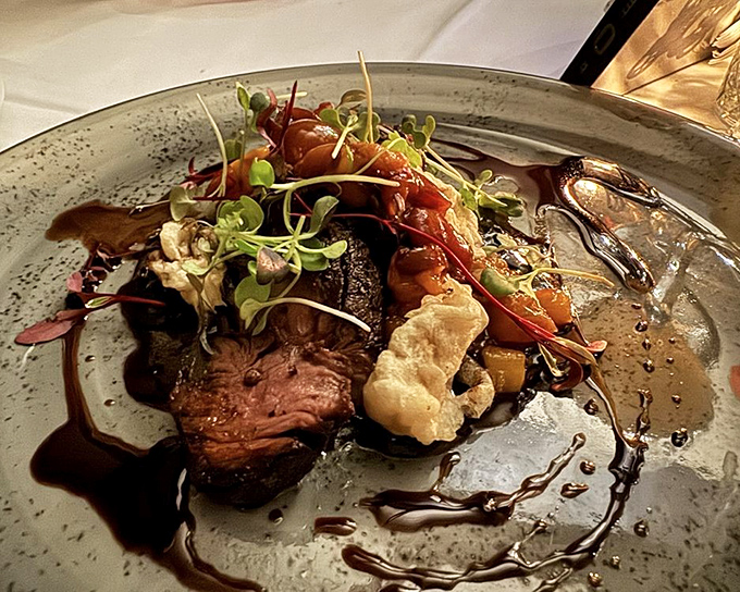 This hanger steak and seafood combo isn't just dinner—it's edible artwork that somehow manages to taste even better than it looks.