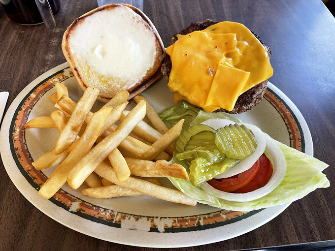 The holland burger that launched a thousand road trips. Perfectly charred patty, melty cheese, and those fries—this is why diets were meant to be broken.
