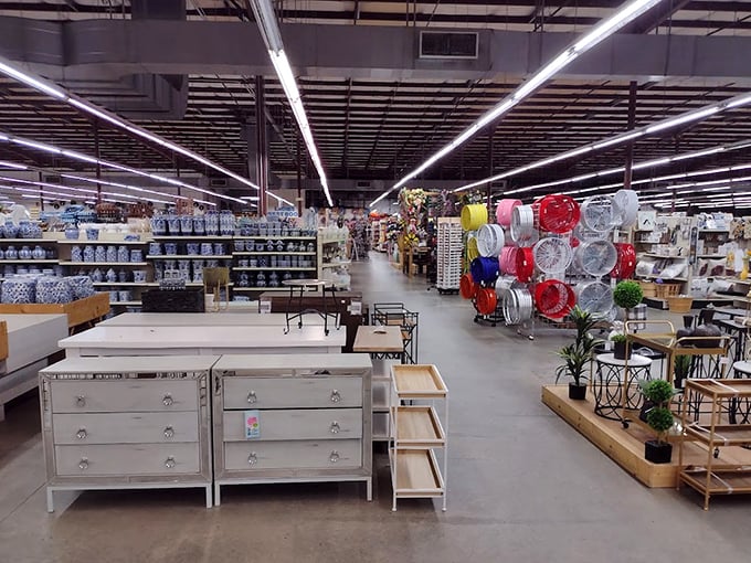 Home goods displayed under industrial lighting prove that style doesn't need to be expensive—just thoughtfully arranged on the right shelf.