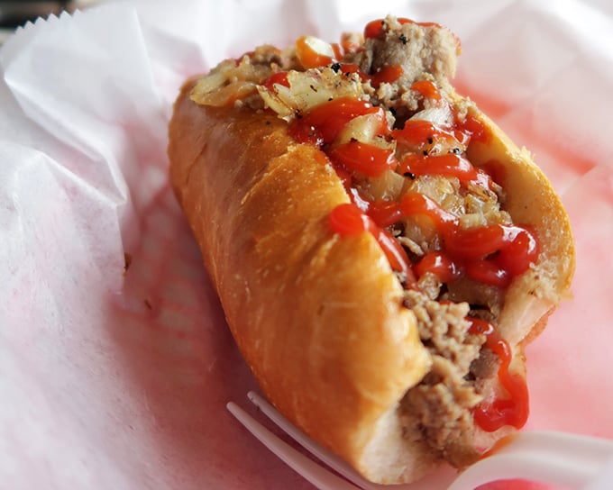 Not just any hot dog—a Zandy's hot dog, where beef, bun, and toppings come together in perfect harmony, crowned with a zigzag of ketchup.