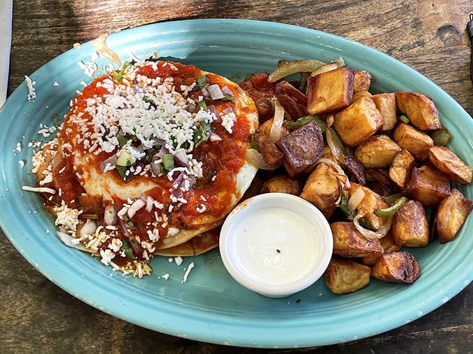 Huevos Rancheros that deliver a fiesta on a plate, with vibrant ranchero sauce and perfectly crisp potatoes that deserve their own fan club.