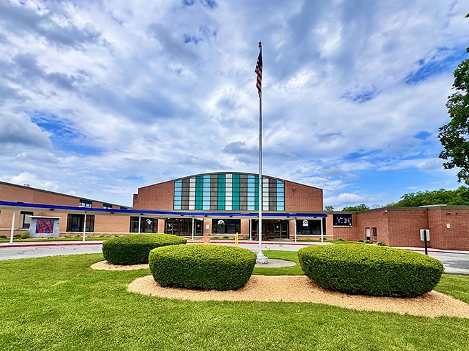 This modern community building serves as Huntingdon's gathering place, where small-town democracy happens beneath those distinctive teal windows.