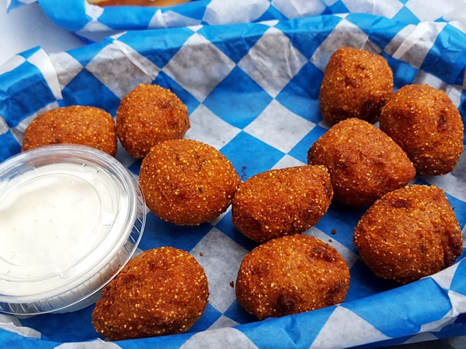 Hush puppies so perfectly golden they'd make a Southern grandma nod in approval. Crispy outside, tender inside—the ideal sidekick.