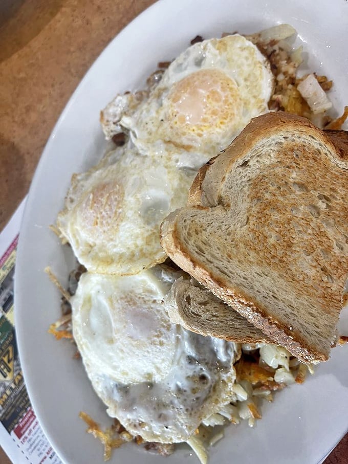 This isn't just breakfast—it's a masterpiece of morning engineering where eggs, potatoes, and meat create the perfect bite every time.