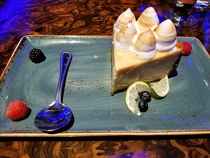 Key lime pie with toasted meringue peaks that look like tiny ocean waves. The perfect sweet-tart balance to end your underwater dining adventure.
